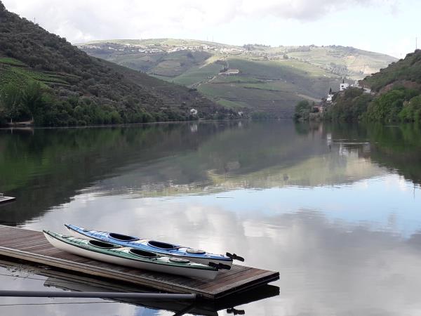Kayak under the Douro cliffs | Responsible Travel